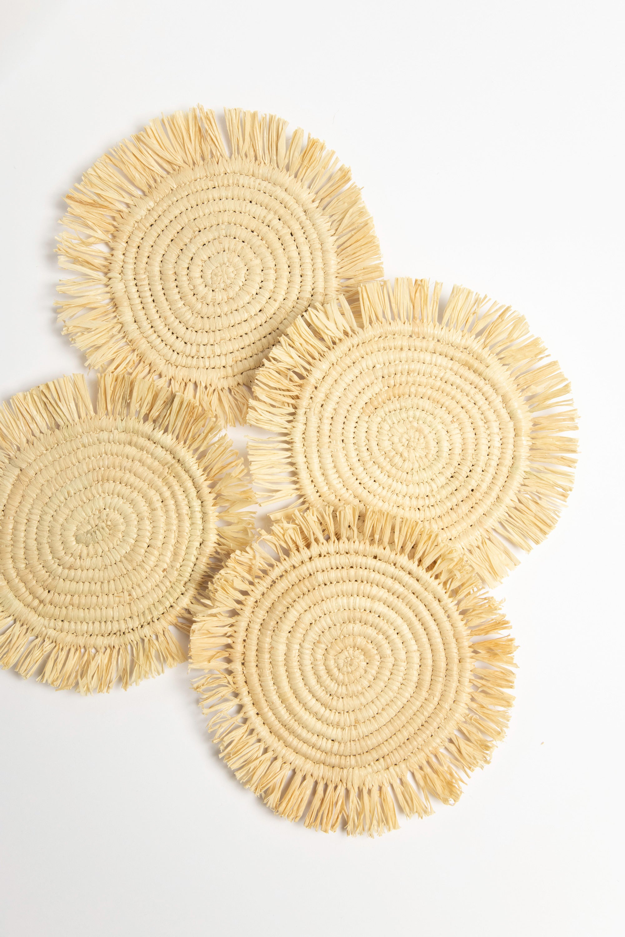 RAFFIA COASTERS HANDMADE IN MOROCCO – INK + PORCELAIN